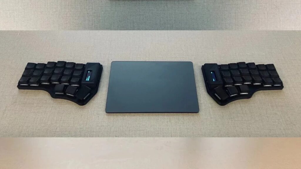 Open-source wireless mechanical keyboard adds track point and ZMK ...